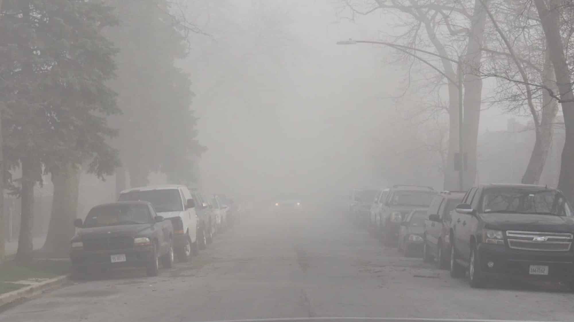 Drone Captures Dust Cloud Covers Little Village After Smokestack Demolition
